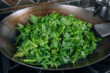 Stir-Fried Tong ho (Chrysanthemum Greens - 炒茼蒿) - The Woks of Life